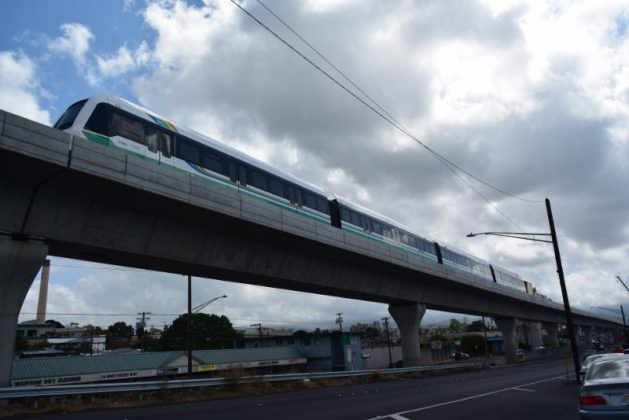 Metro train travels on Honolulu's elevated rail network for the first ...