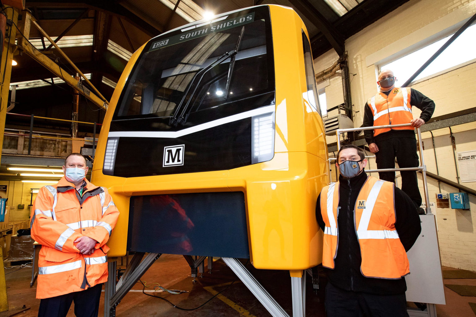 Metro drivers step on board a full-size replica of their new trains ...