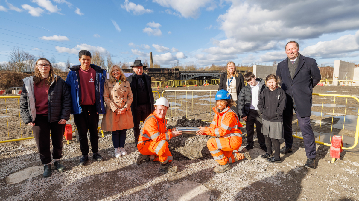 Rail Minister marks TRU visit with time capsule - Rail UK